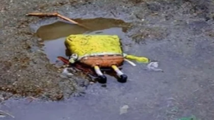 Spongebob suffering in the dirt water