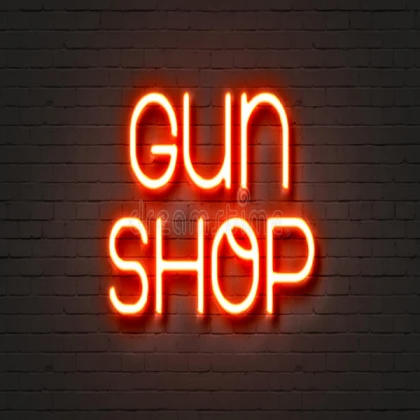 neon gun shop sign